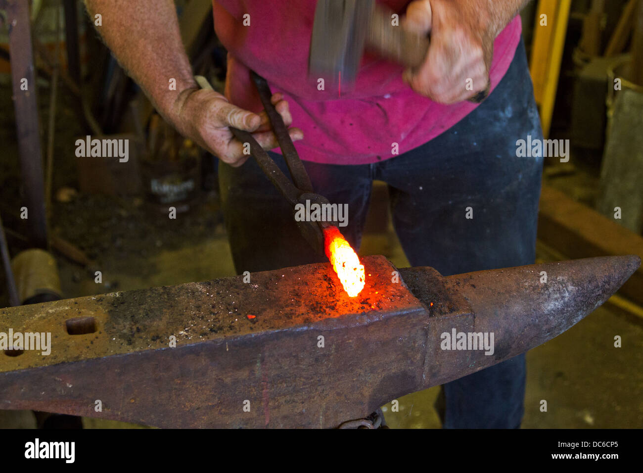 Forge beating hi-res stock photography and images - Alamy