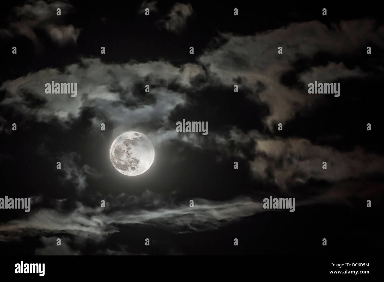 Dramatic sky with full moon Stock Photo - Alamy