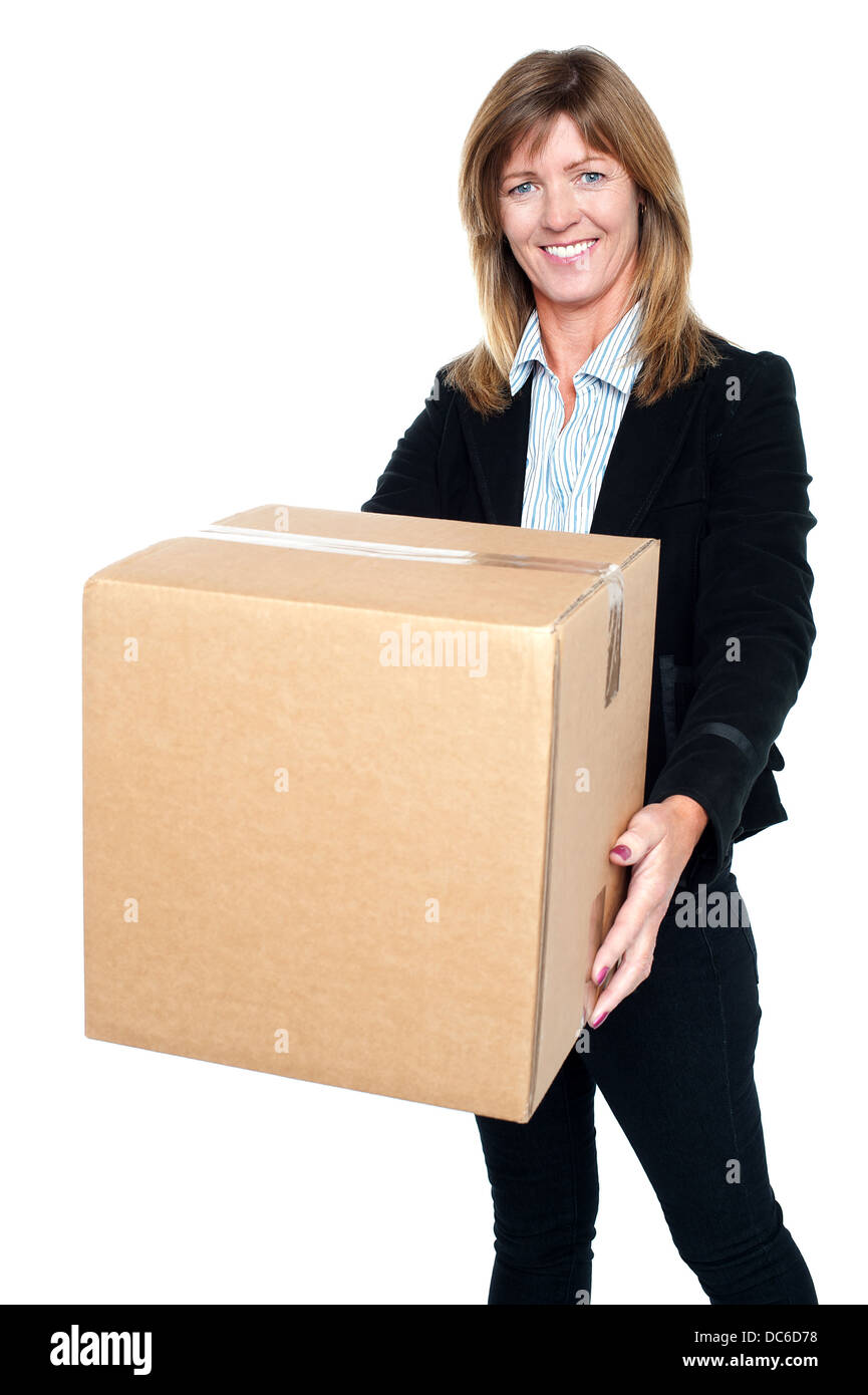 Woman carrying a box Cut Out Stock Images & Pictures - Alamy