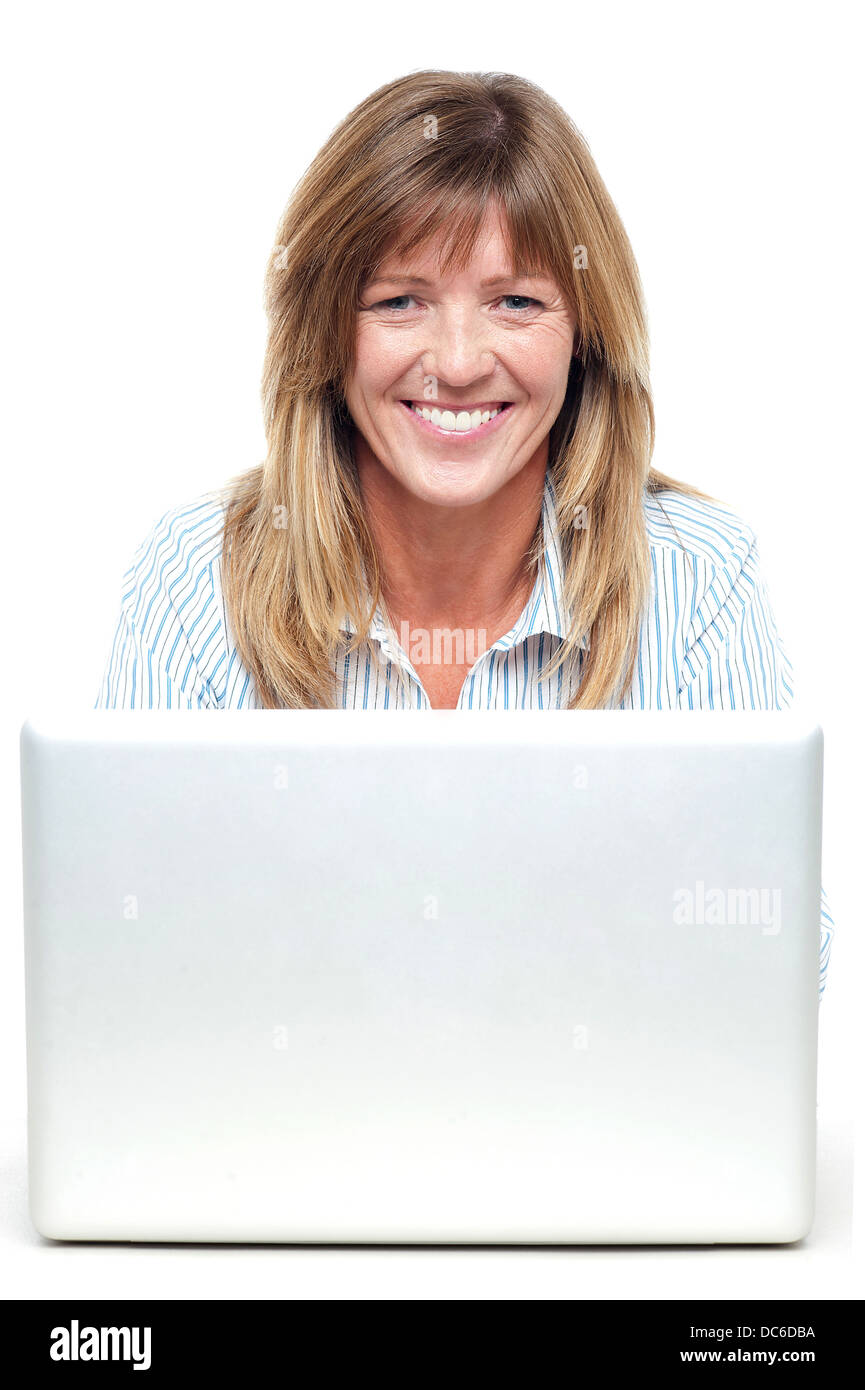 Smiling woman working on office Cut Out Stock Images & Pictures - Alamy