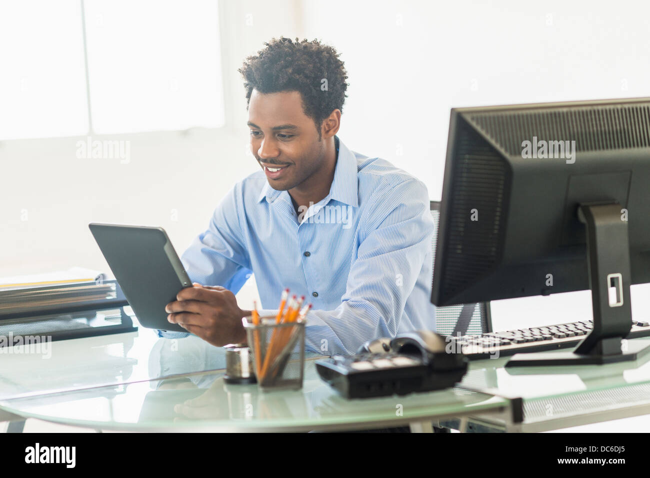 African businessman working digital hi-res stock photography and images ...