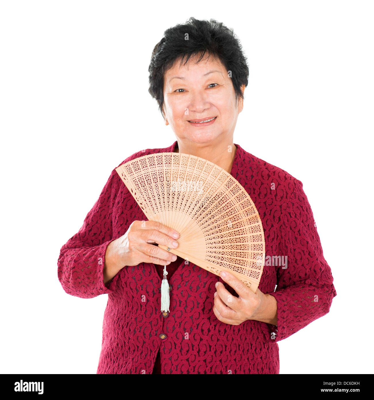 Attractive asian woman holding traditional fan hi-res stock photography ...