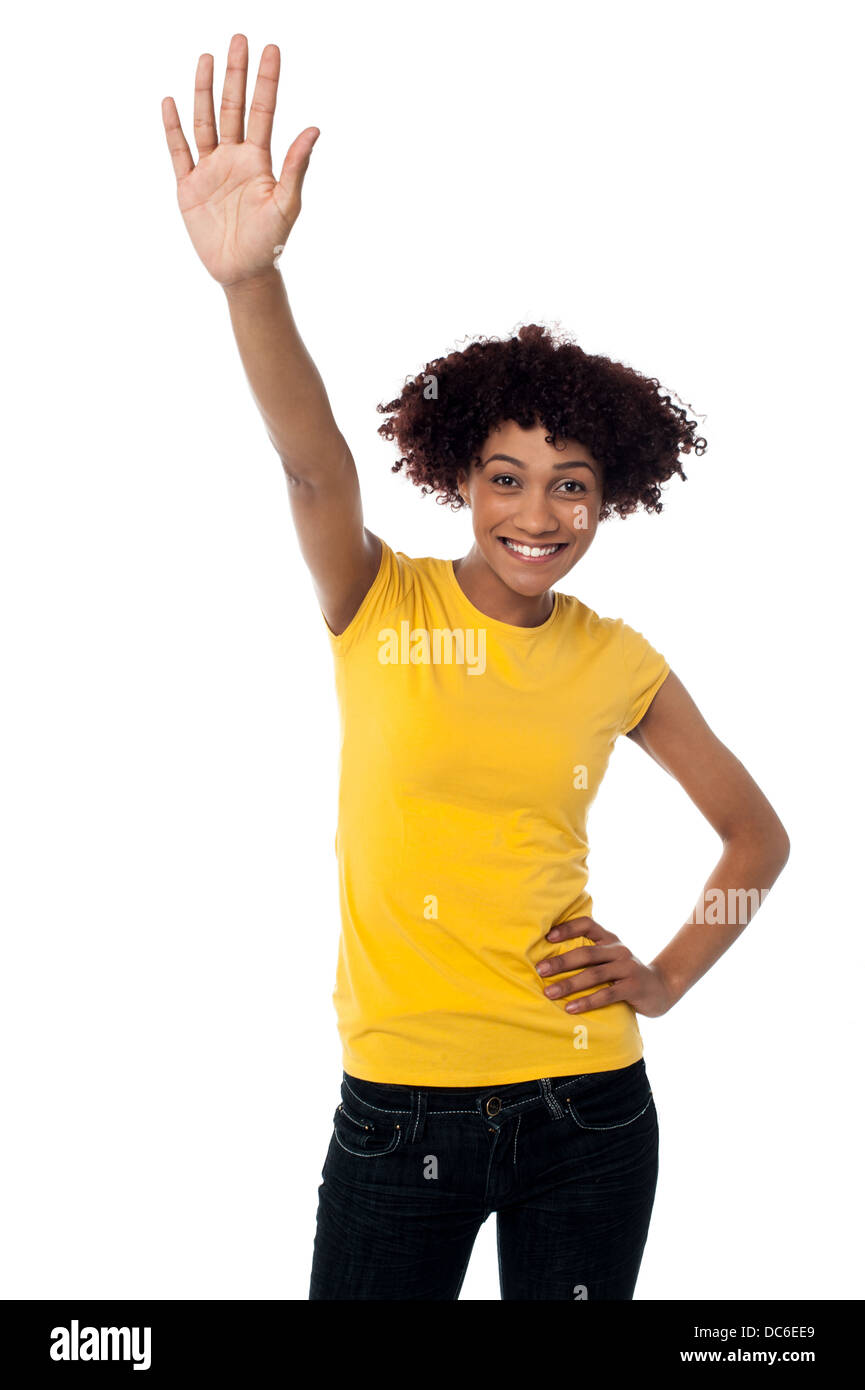 Stylish female waving her hand at you Stock Photo - Alamy