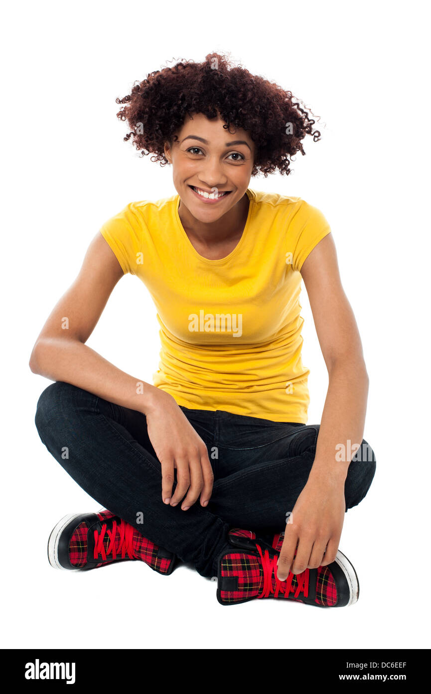 Woman crossed legs sitting fashion Cut Out Stock Images & Pictures - Alamy