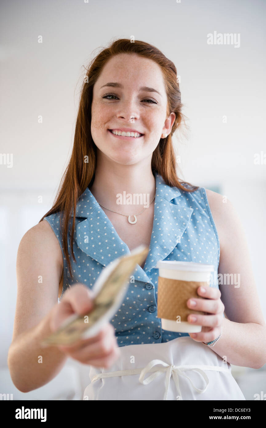 Teenage girl's (14-15) first job Stock Photo - Alamy
