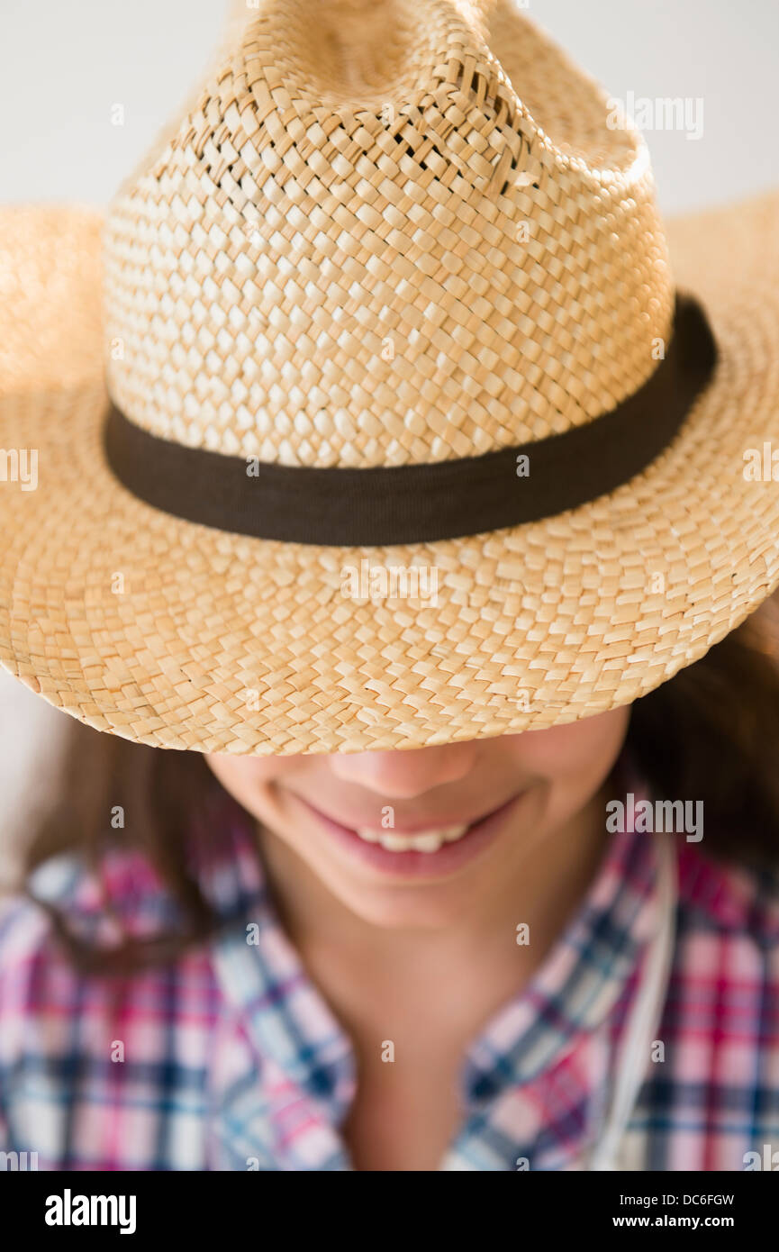 Girl (8-9) wearing straw hat Stock Photo - Alamy