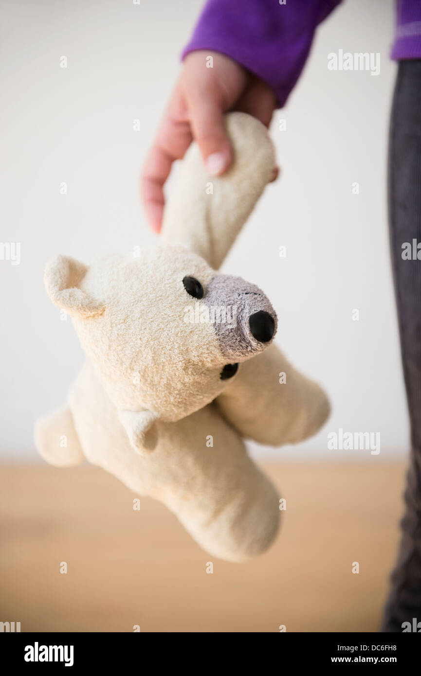 Child holding head sad hi-res stock photography and images - Alamy