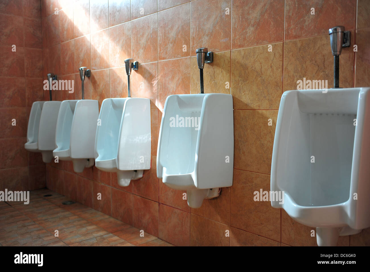 Row of Urinals Stock Photo - Alamy