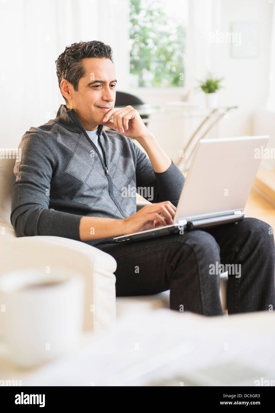 Man working at home Stock Photo - Alamy
