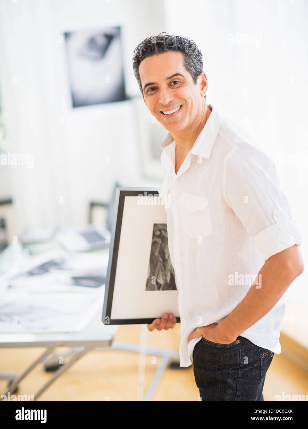 Portrait of man in his photography studio Stock Photo - Alamy