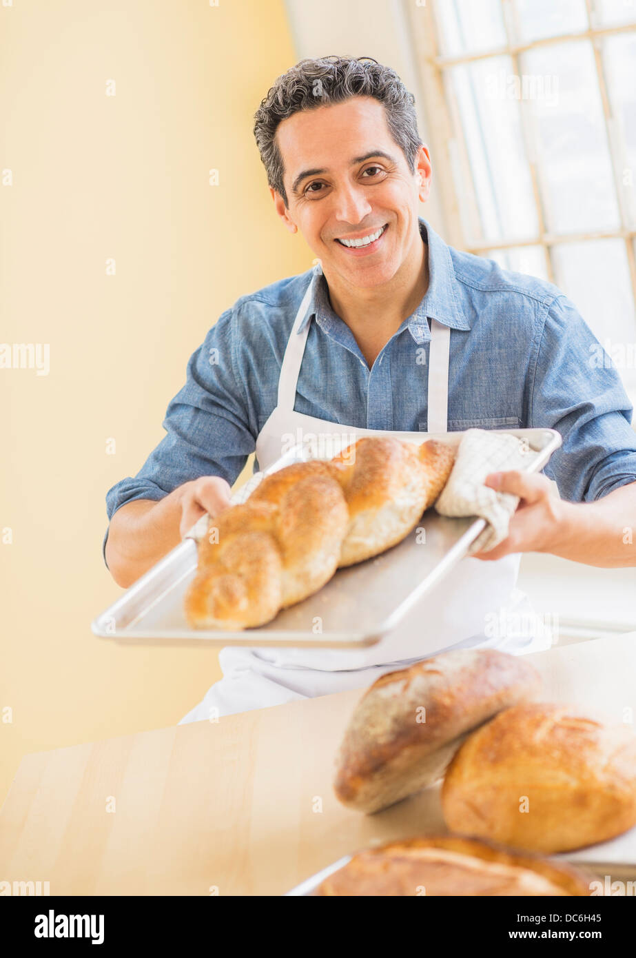 Portrait of baker Stock Photo - Alamy