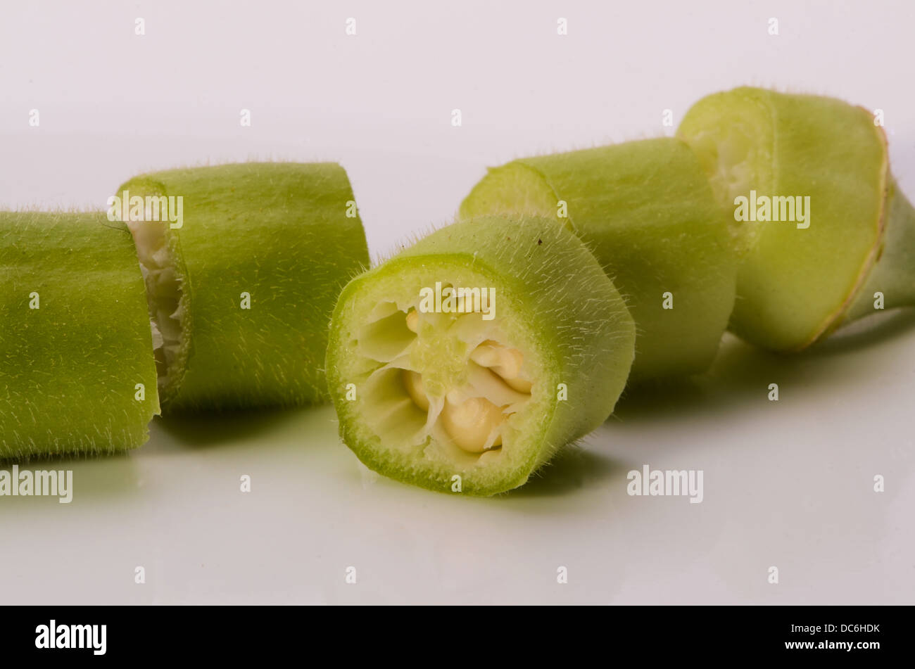 Diced okra pod on white background Stock Photo - Alamy