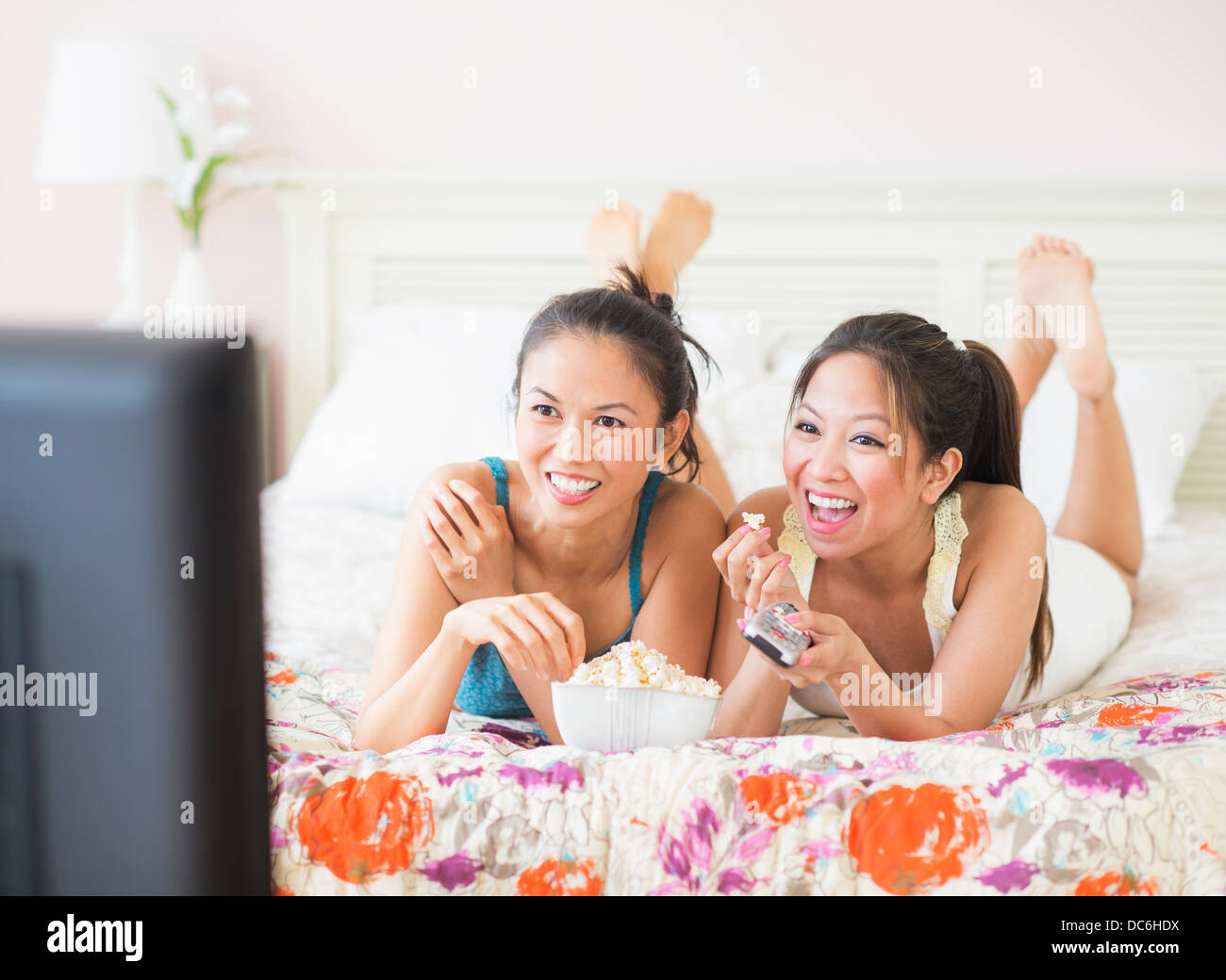 Two young women enjoying snack hi-res stock photography and images - Alamy