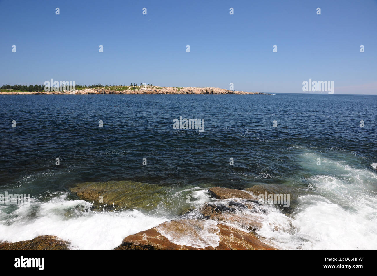 The blue water and rocky coast of Maine at Schoodic Point in Acadia ...