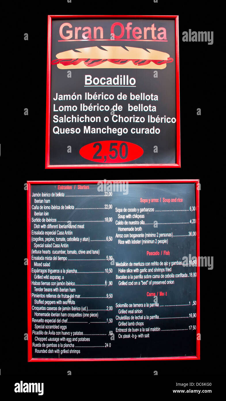 Notice board with snacks and various dishes in Spanish Stock Photo - Alamy