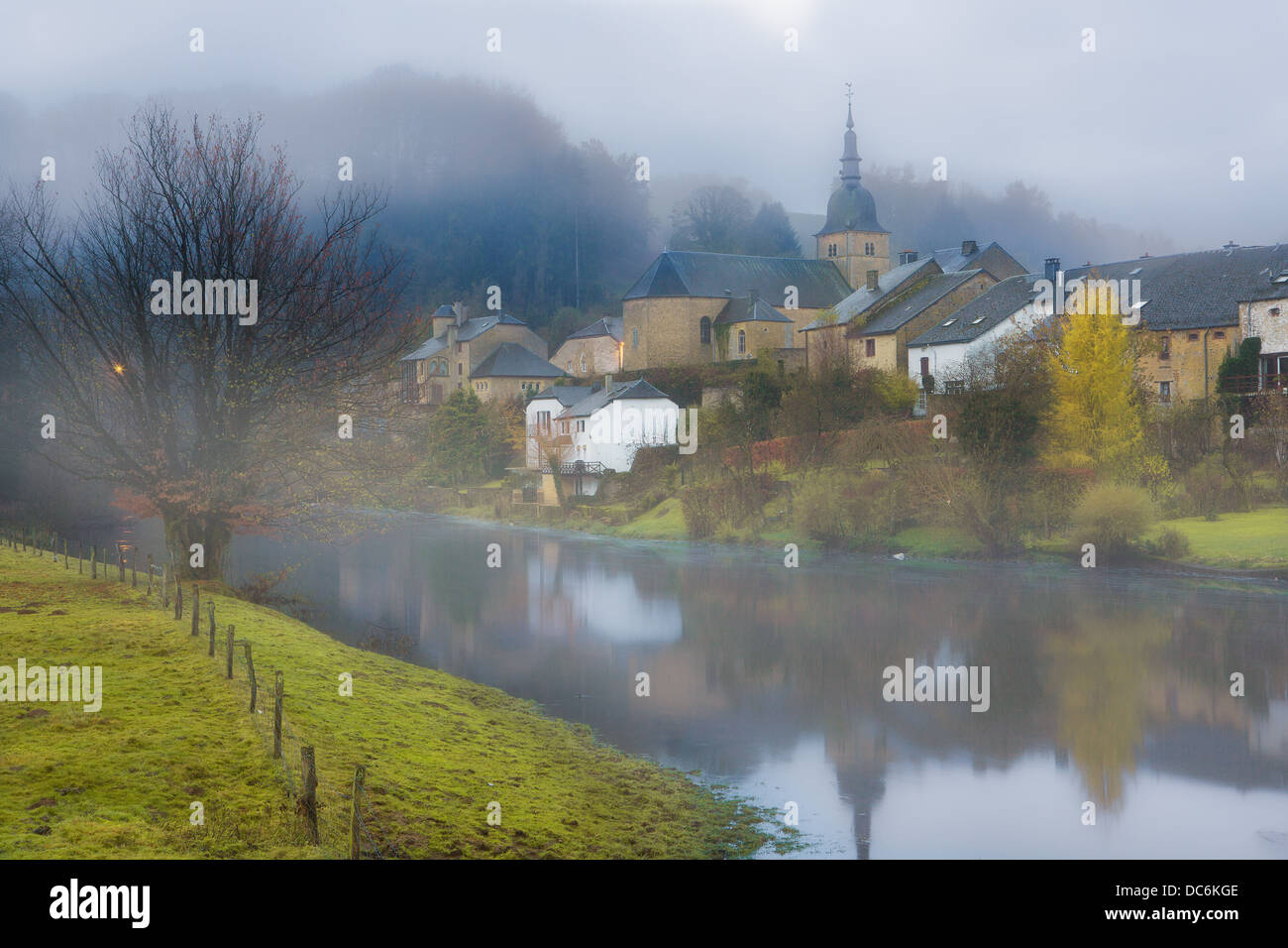 Fog hanging over the Semois river at Chassepierre village in the Gaume ...