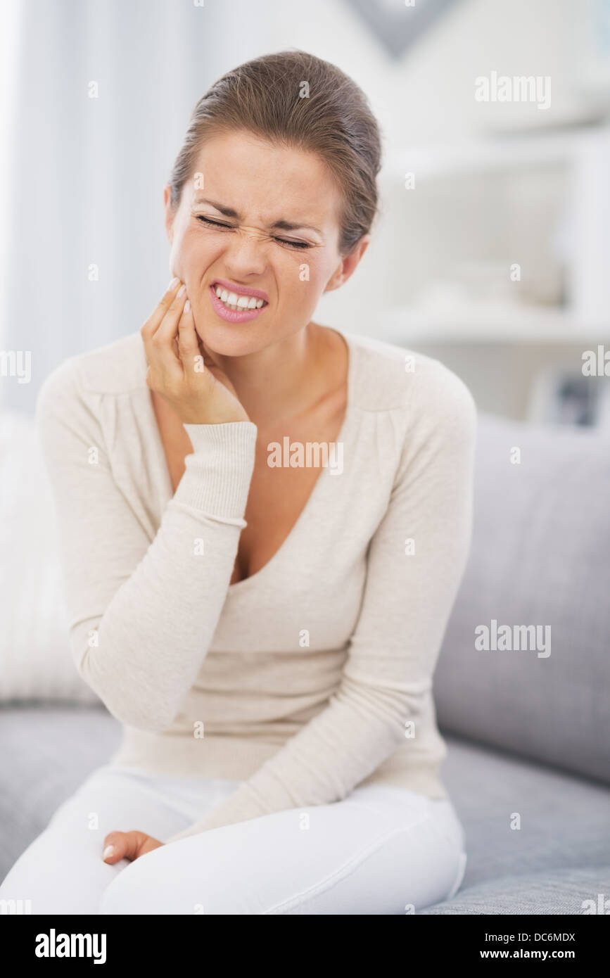 Young woman having toothache Stock Photo - Alamy