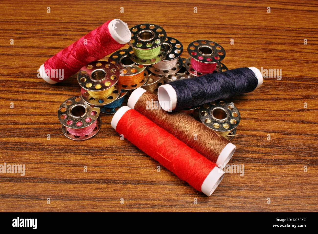 Colorful threads for sewing machine Stock Photo - Alamy