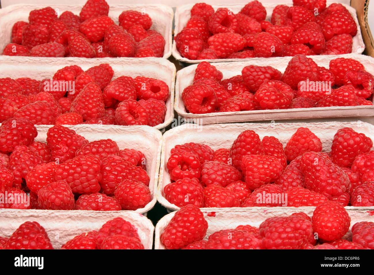 Raspberries baskets box paper fruit fresh Stock Photo - Alamy