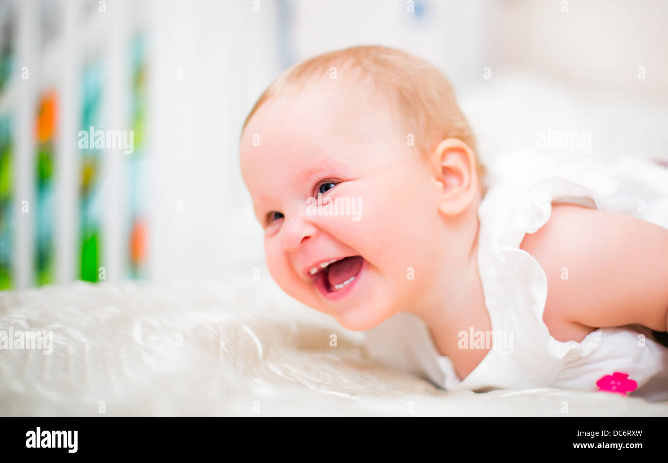 one years old baby girl on a light background Stock Photo - Alamy