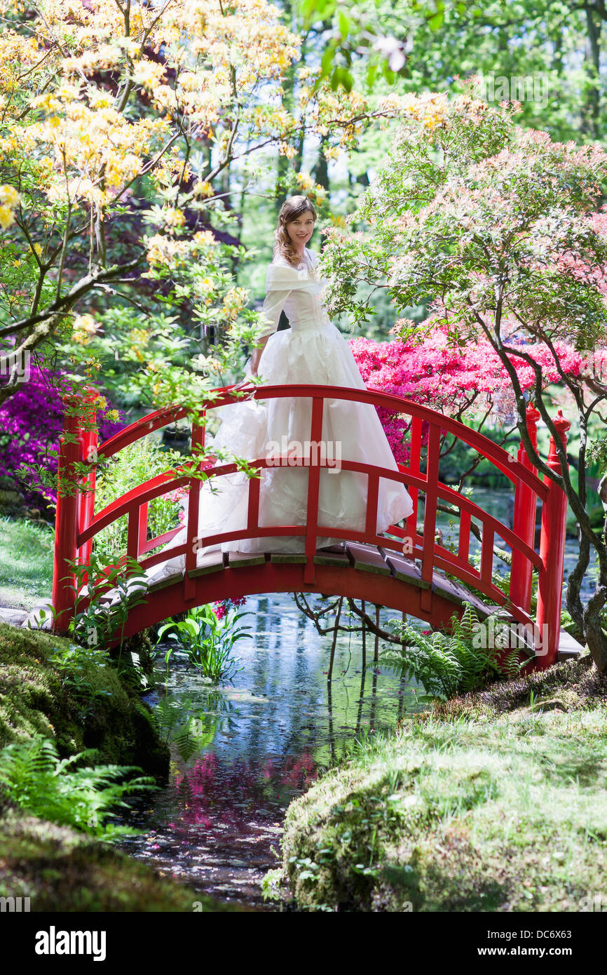 Netherlands. Hague, Bride standing on garden bridge Stock Photo - Alamy
