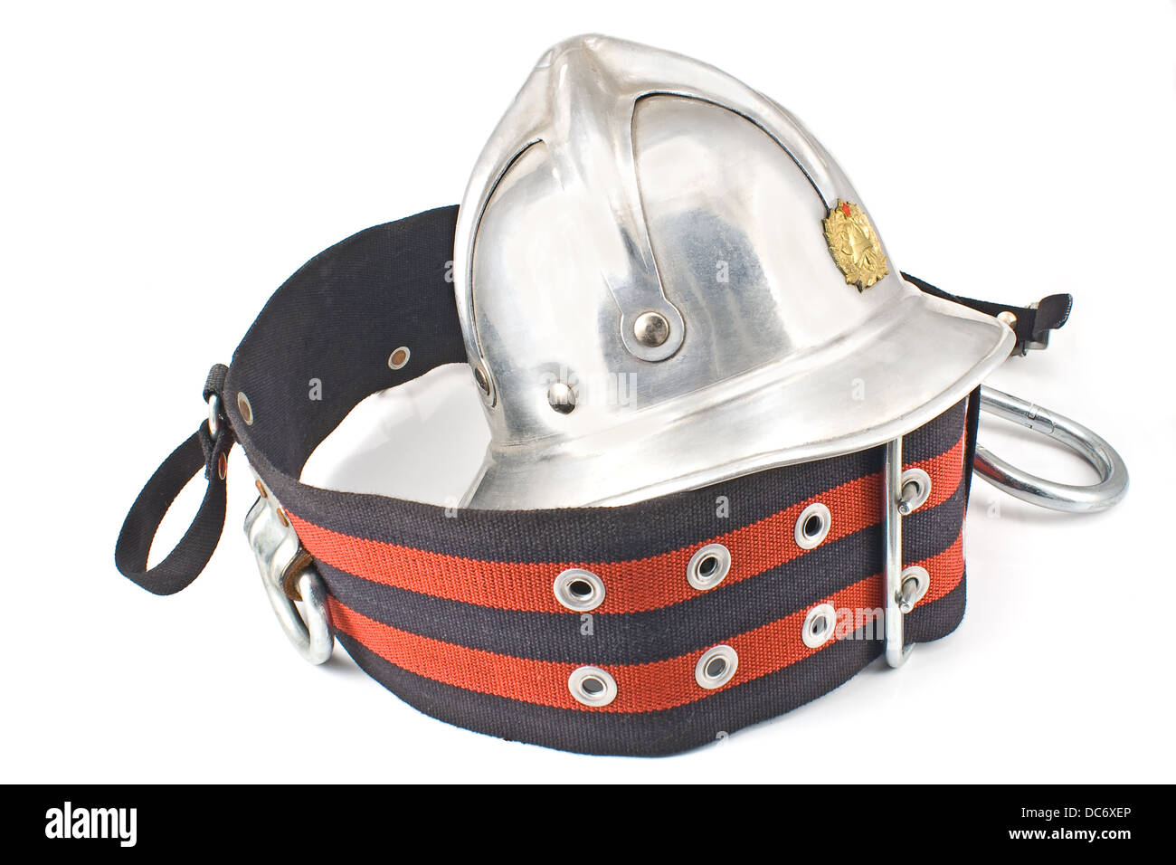 Old fireman's metallic helmet with belt isolated on white Stock Photo ...