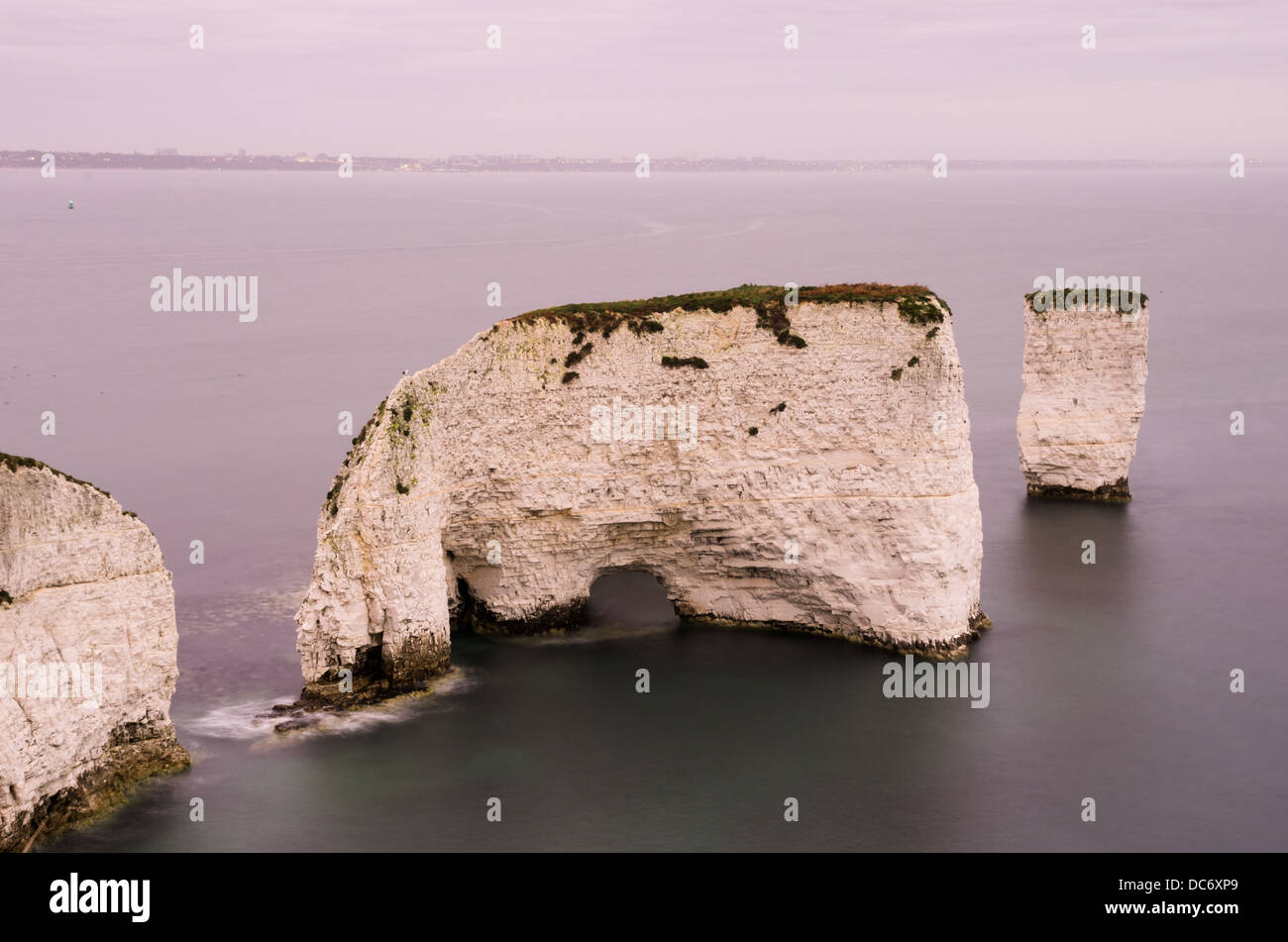 A view of white limestone cliffs in pink sunrise light Stock Photo - Alamy