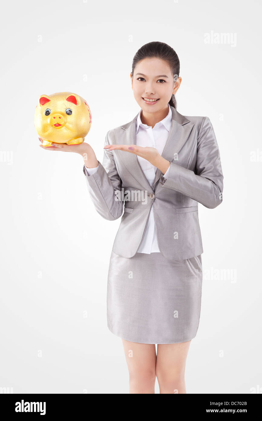 Young indian business woman with coin hi-res stock photography and ...