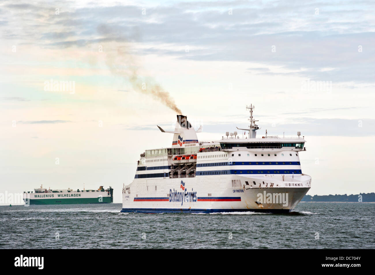 A Brittany Ferries vessel passes a Wallenius Wilhelmsen cargo ship in ...