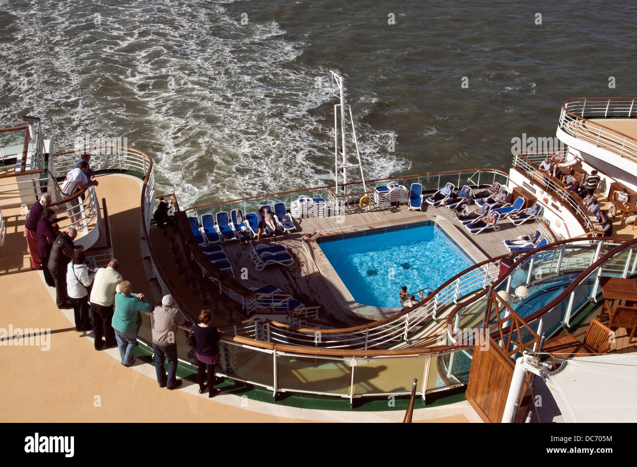 riding a wave Ventura pushing off to sea people relaxing watching on as ...