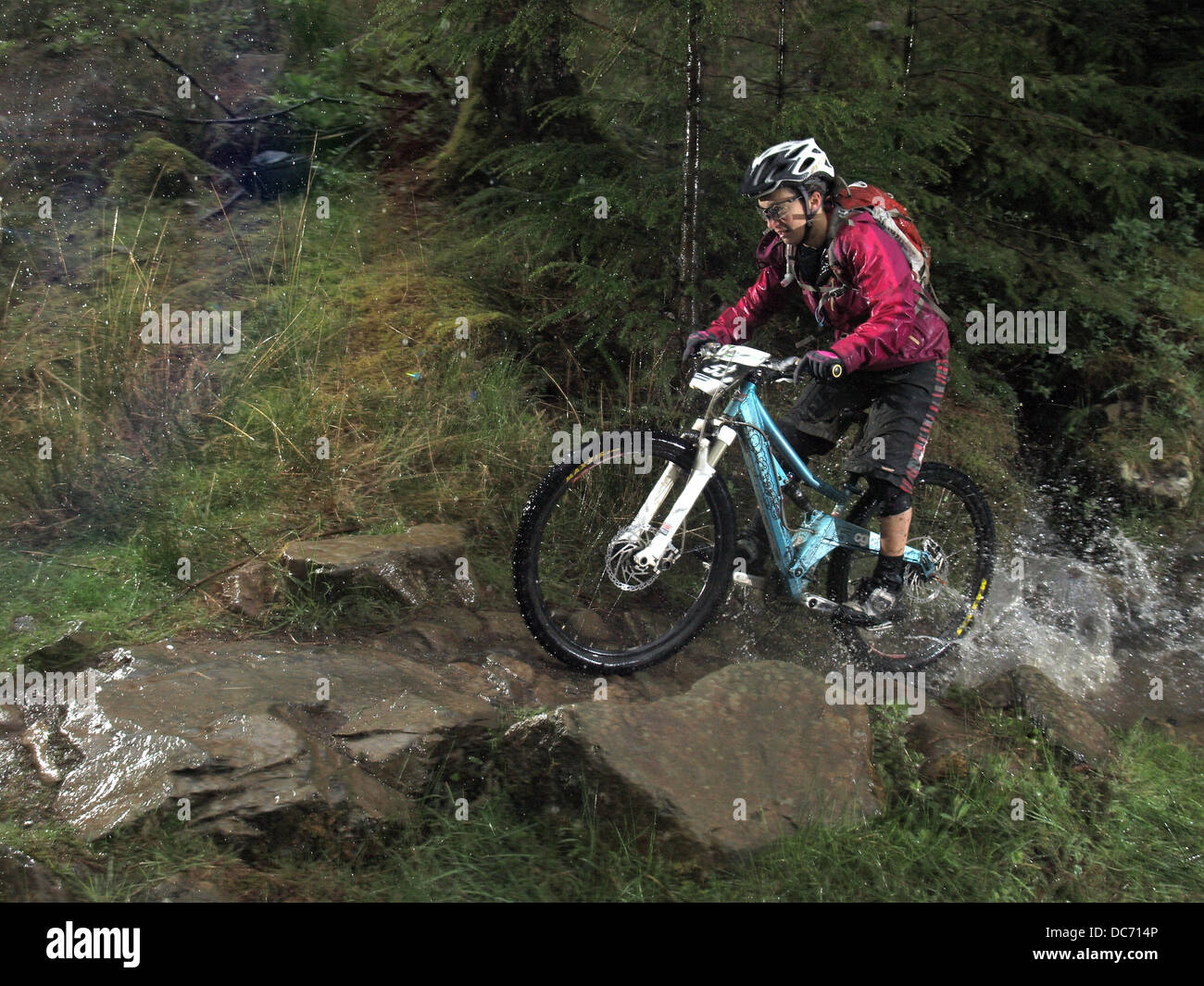 Mountain biker in the rain Stock Photo - Alamy