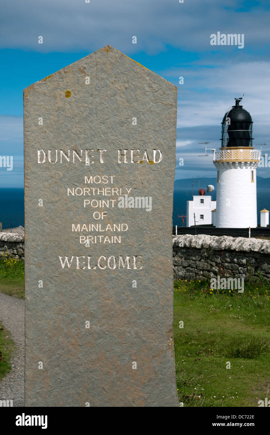 Stone welcome sign and lighthouse at Dunnet Head, most northerly point ...