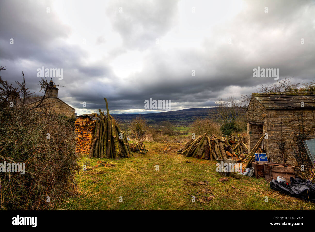 Wood stack stacks for winter stored outside in yard Yorkshire Dales, UK ...