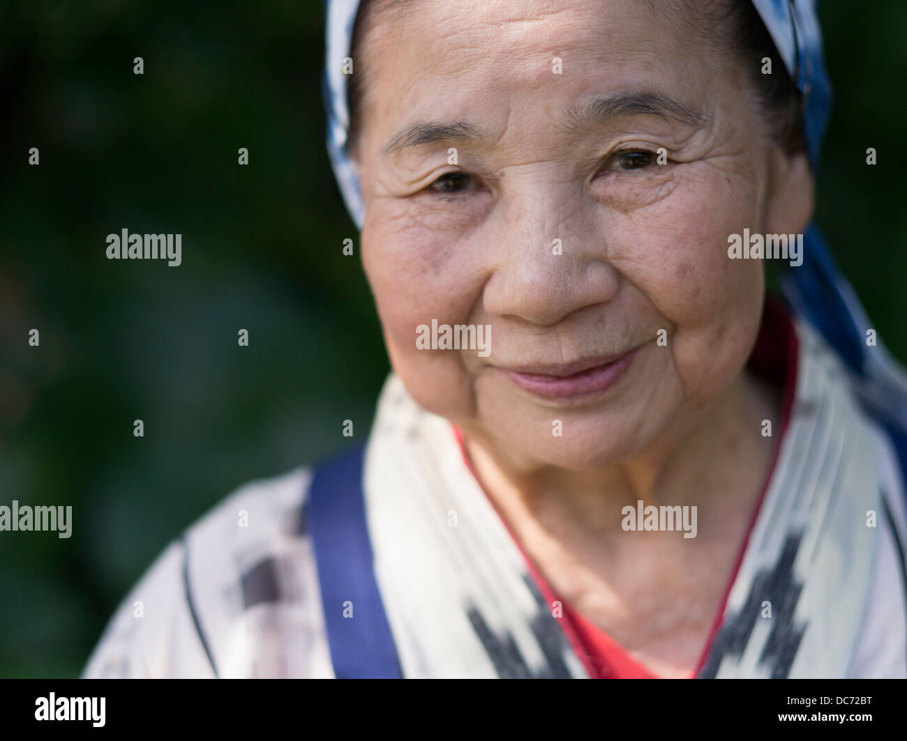 Okinawan woman in traditional clothing at Ryukyu Mura a historical ...