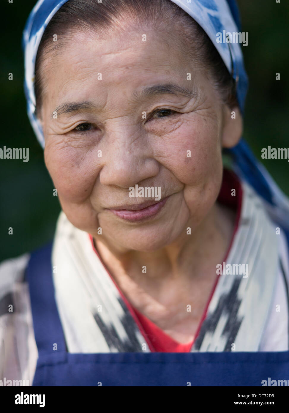 Okinawan woman in traditional clothing at Ryukyu Mura a historical ...