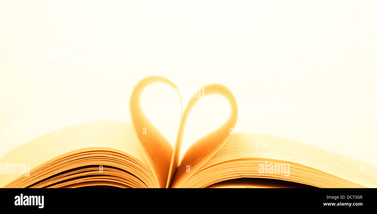 opened book and heart shape Stock Photo - Alamy