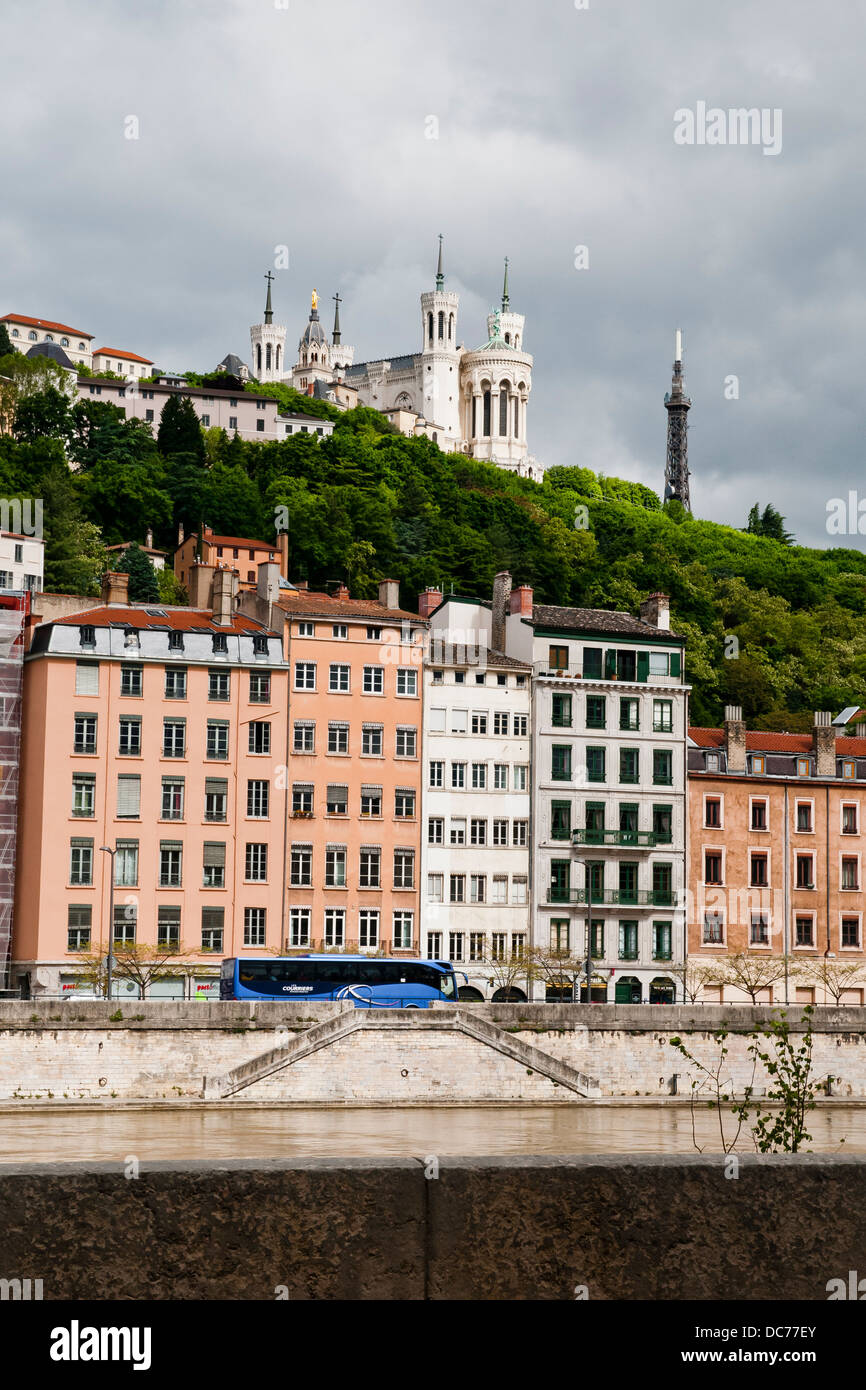 Waterfront of Rhona river and Notre Dame Basilica on the hill, Lyon ...