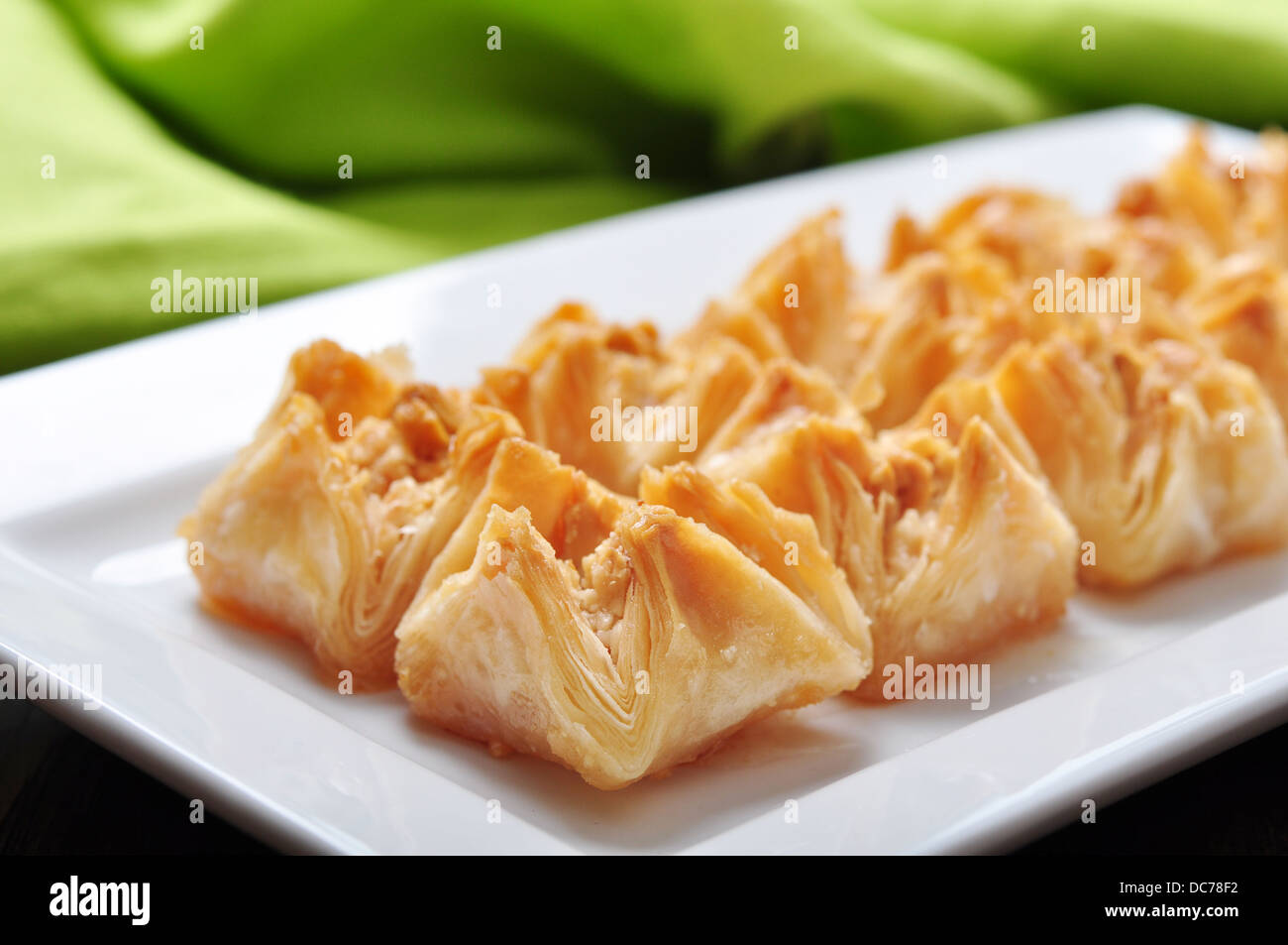 Traditional Turkish arabic dessert - baklava with honey and nuts Stock ...