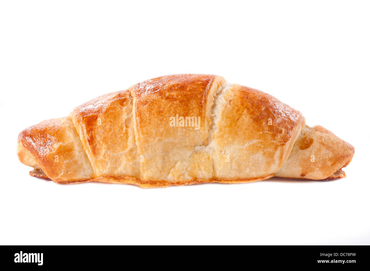 Single French croissant isolated on white background Stock Photo - Alamy