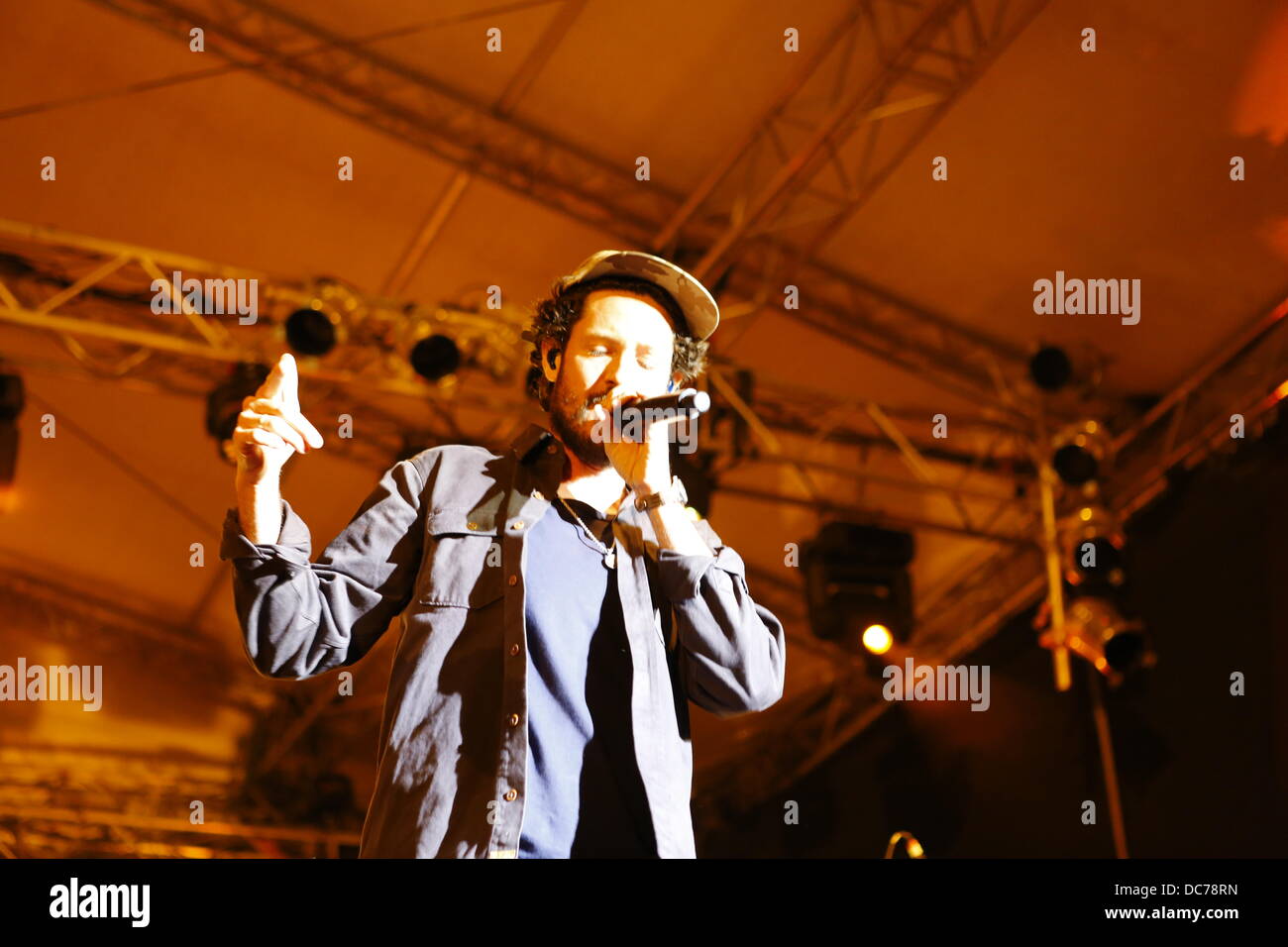 Worms, Germany. 10th August 2013. Singer Max Herre is pictured on stage ...