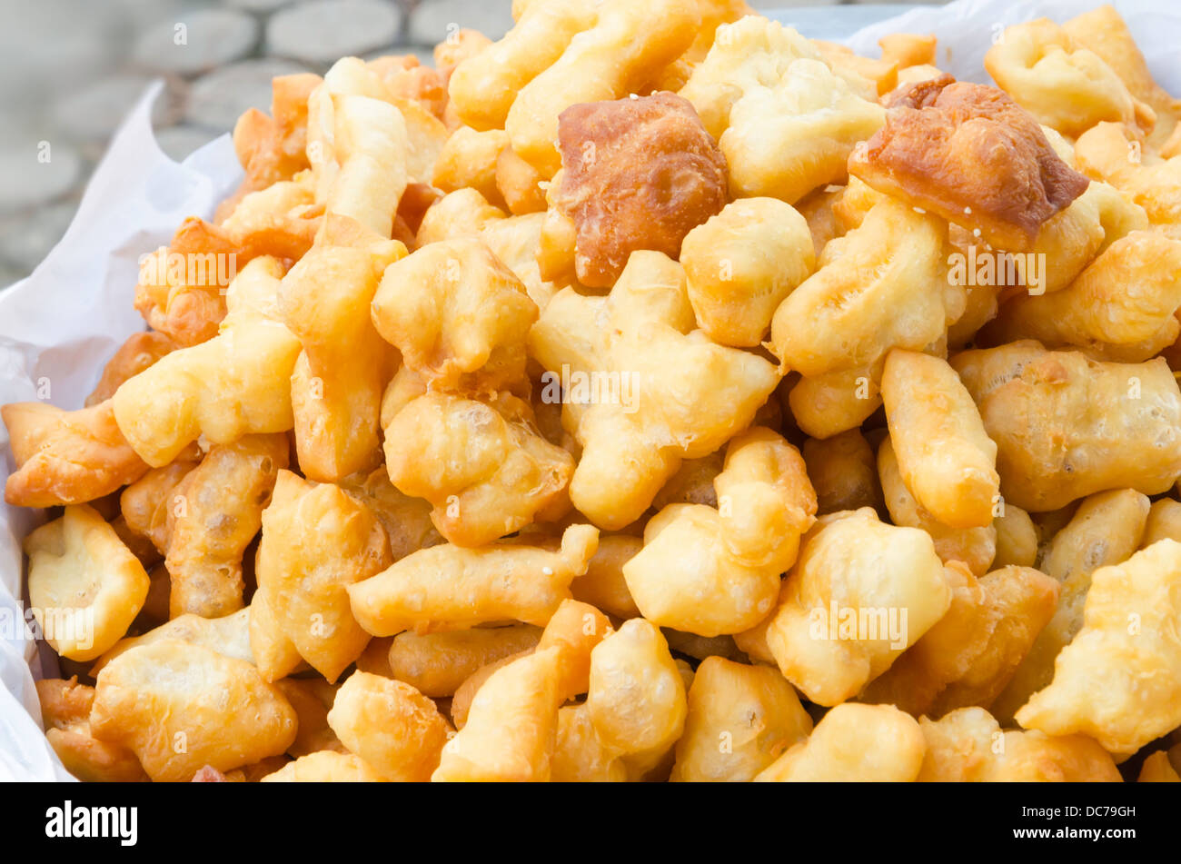 Deep-fried dough stick for use as a breakfast or snack Stock Photo - Alamy
