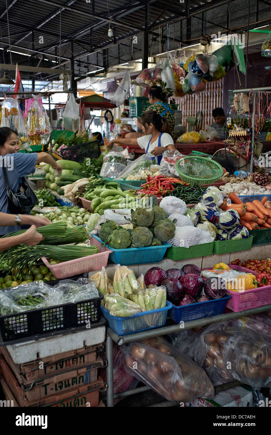 Thailand indoor market. Colourful display of vegetables and food ...