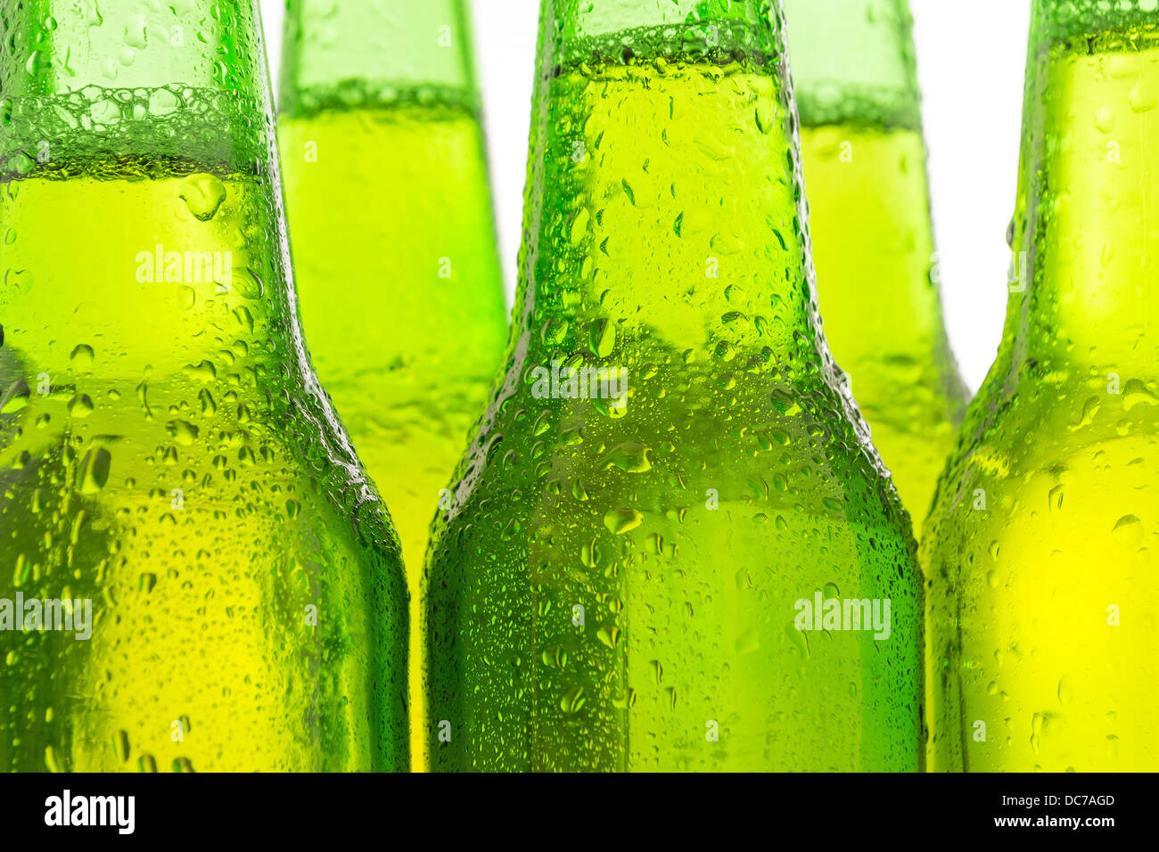 Row of beer bottles Stock Photo - Alamy