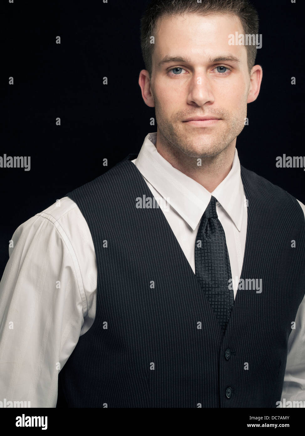 Young businessman white shirt, waistcoat and tie Stock Photo - Alamy