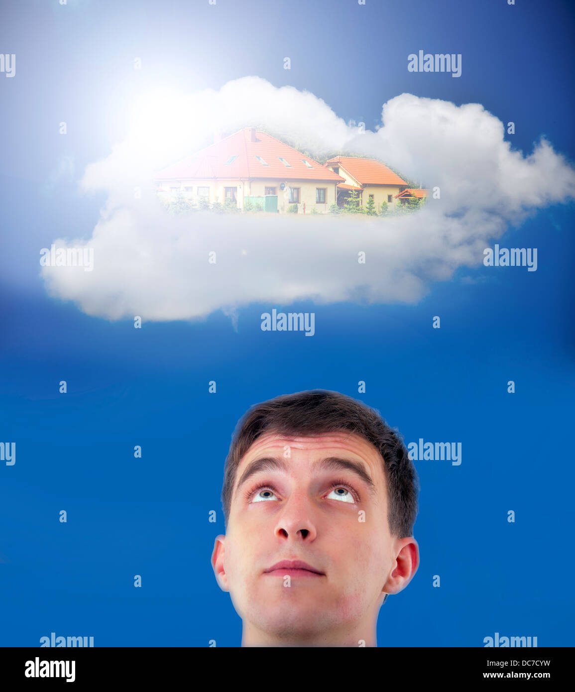 Young adult man dreaming about new house Stock Photo - Alamy