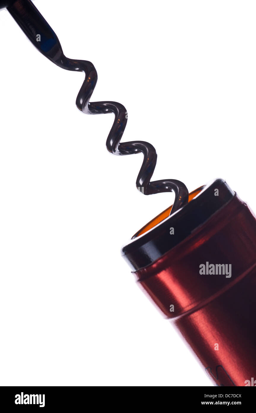 A spindle of a cork screw in the cork of a wine bottle Stock Photo - Alamy