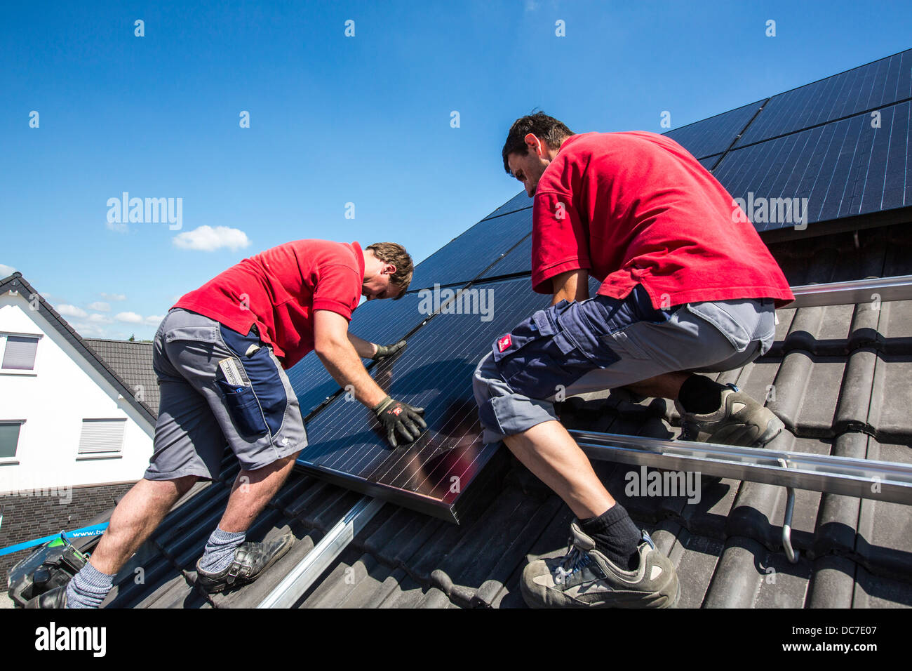 Construction of a solar energy system on a house. Installation of solar ...