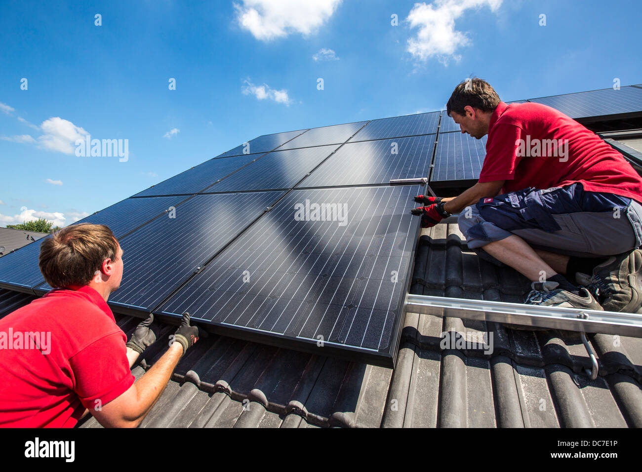 Construction of a solar energy system on a house. Installation of solar ...