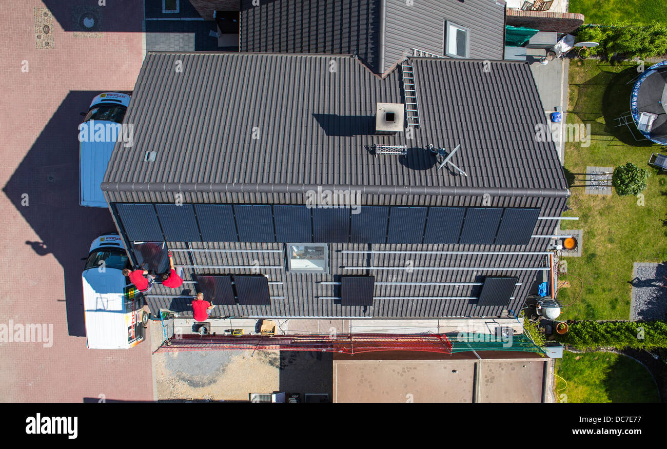 Construction of a solar energy system on a house. Installation of solar ...