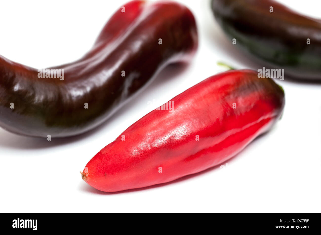 Three pointed pepper on a white background Stock Photo - Alamy